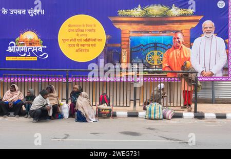 Devotees arrives at Ayodhya, on the eve of consecration ceremony of the Ram temple, in Ayodhya ...