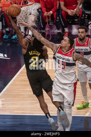 Utah Jazz guard Collin Sexton, right, drives past Phoenix Suns guard ...