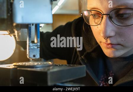 Speicher, Germany. 25th Jan, 2024. Engraver Clara Maria Katzmann works ...