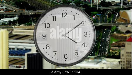 Image of clock ticking over cityscape Stock Photo - Alamy