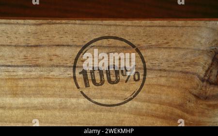 100% 100 percent stamp printed on cardboard box. Full hundred ...