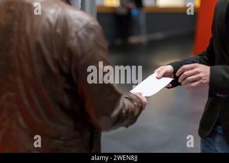 ticket check before entering opera Stock Photo - Alamy