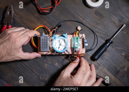 bomb maker constructing home made explosive Stock Photo - Alamy