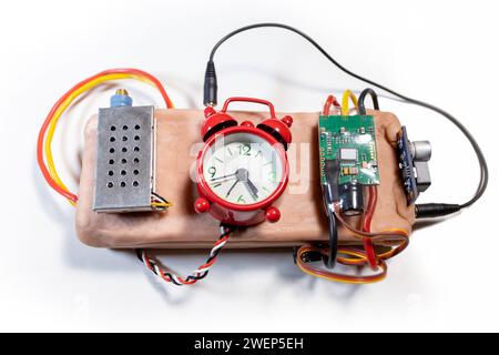 home made time bomb on white background Stock Photo - Alamy