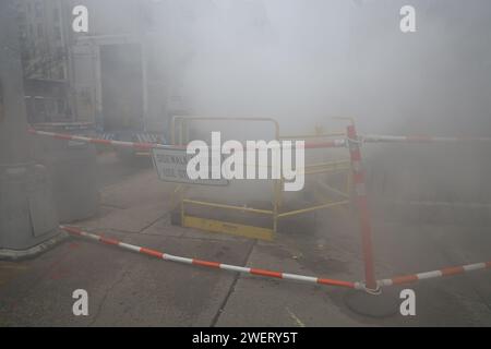 A view of Con Ed steam man hole sweeps through the air on First Avenue ...