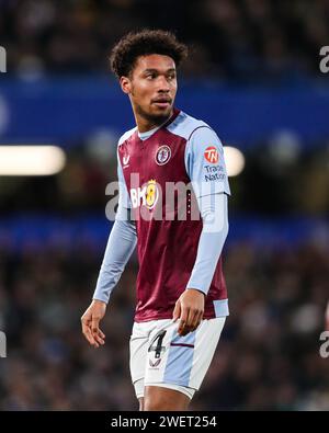 Aston Villa's Ezri Konsa, second right, scores his side's third goal ...
