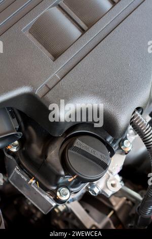 closeup engine oil cap in car engine Stock Photo - Alamy