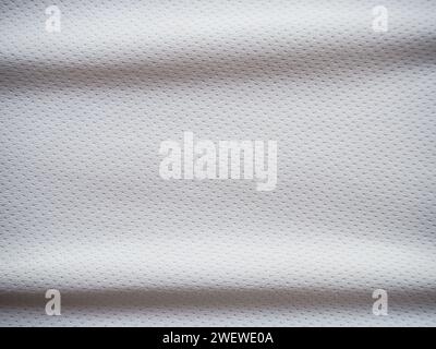 White sports jersey fabric texture background Stock Photo - Alamy