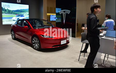 Tesla car on display at a Tesla dealership or showroom in Siam Mall or ...