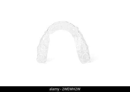 Invisalign braces or invisible retainer on pink background. High ...