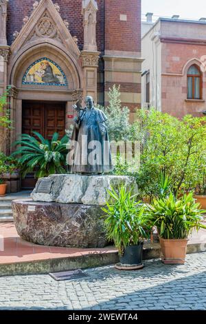The statue of Pope John XXIII in the garden of the Church of St Anthony ...