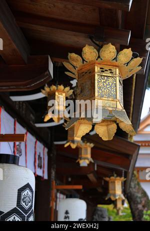 Japan hanging lantern lamp light on wooden post in Japanese garden with ...