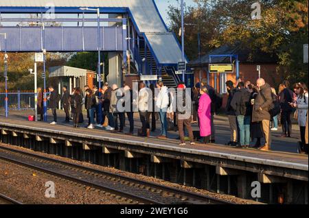 Rush hour commuters waiting at Bicester North railway station for a ...