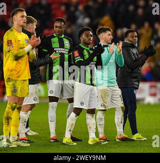 Brighton and Hove Albion players applaud the fans following victory ...