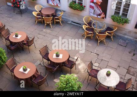 street cafe, tables and stools on the street. restaurant, cafeteria ...