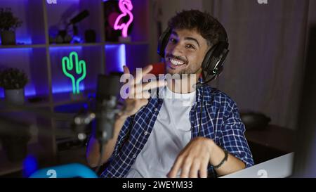 Young arab man streamer smiling confident speaking at gaming room Stock ...