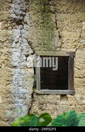 Vernacular Hakka tulou in Fujian, China: Wall of rammed earth marked by ...