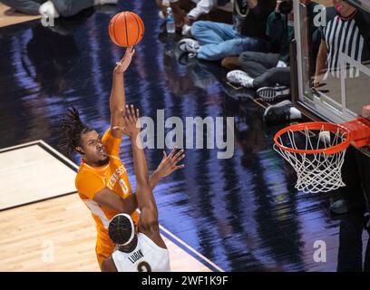 Tennessee forward Jonas Aidoo (0) shoots a basket past Vanderbilt guard ...