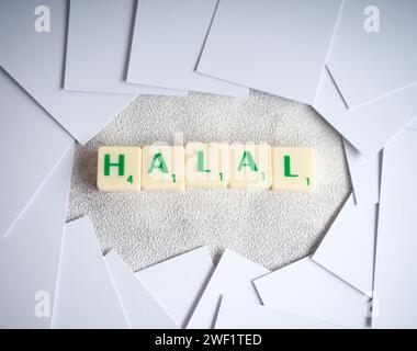 Scrabble letters spelling words HALAL. Halal is an Arabic word that ...
