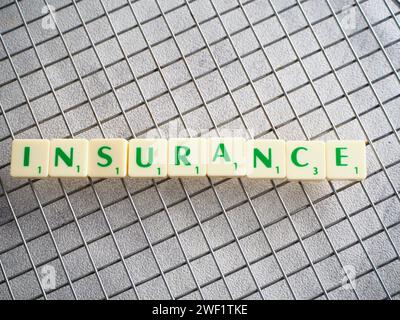 Scrabble letters spelling words INSURANCE Stock Photo - Alamy