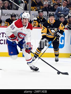 Pittsburgh Penguins' Rickard Rakell, center, celebrates after his goal ...