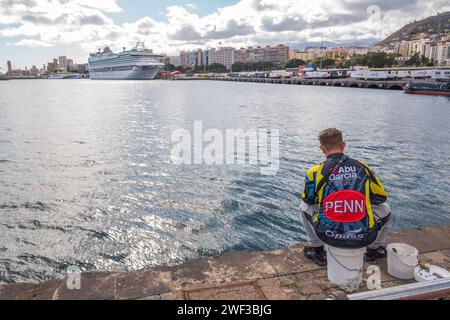 Local fishermen fishing off the quay at the main cruise terminal in ...