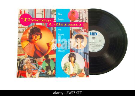Cover of the debut album YOU BROKE MY HEART IN 17 PLACES by British ...