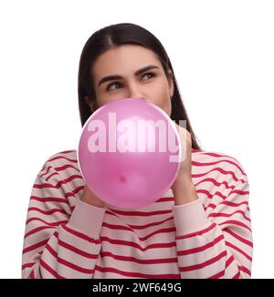 Woman inflating pink balloon on white background Stock Photo - Alamy