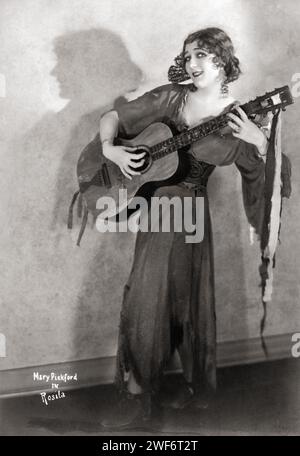 Mary Pickford in Rosita - full-length portrait, playing the guitar ...