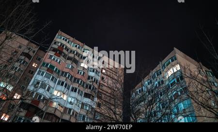 Multistory soviet building at the night with blue light Stock Photo - Alamy