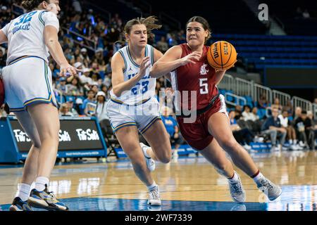 UCLA Bruins guard Charlisse Leger-Walker (5) celebrates after making a ...