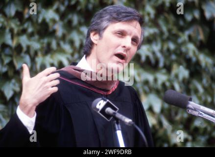Alan Alda in commencement robe, giving speech, 1970s. Photo: Oscar ...