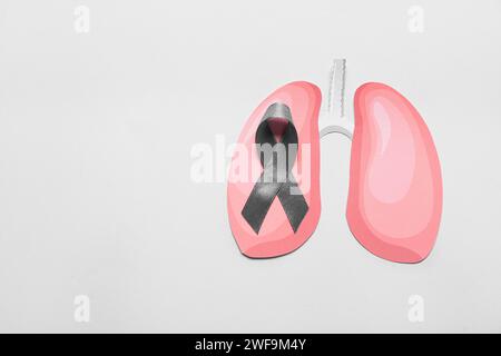 Paper lungs with ribbon on grey background Stock Photo - Alamy