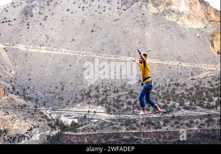 Single male slackline walking in Smith Rock State Park. Central Oregon ...