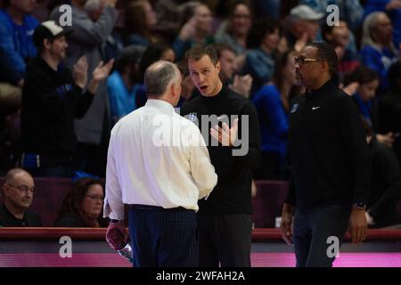 Duke coach Jon Scheyer talks to his team from the sidelines against ...