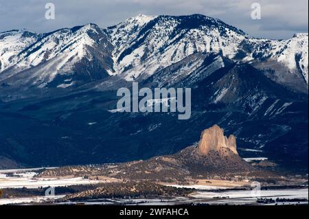 Needle Rock, an old lava plug near Crawford, Colorado and the West Elk ...