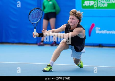 Dane Sweeny of Australia in action against Reilly Opelka of The United ...
