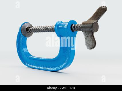 A blue vintage styled G-clamp tool on an isolated white studio ...