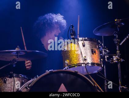 Glass Caves' drummer Elliott Fletcher performing live on stage at ...