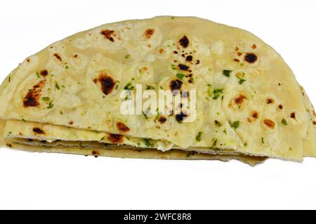 Indian naan bread baked inside a very hot clay tandoor oven, delicious ...