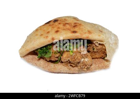 Cow beef brain covered with flour and fried in deep hot oil, a sandwich ...