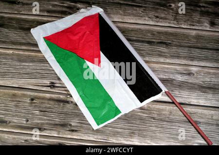 The flag of Palestine, a tricolor of three equal horizontal stripes ...