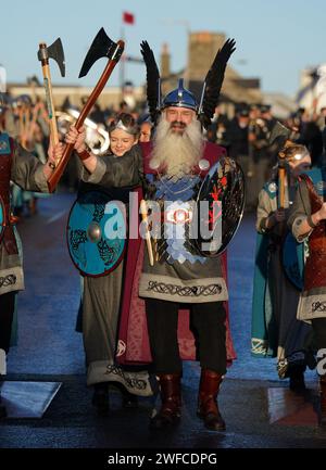 Guizer Jarl Richard Moar leads the Jarl Squad through Lerwick on the ...
