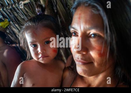 Family of Yagua Indians living a traditional life near the Amazonian ...