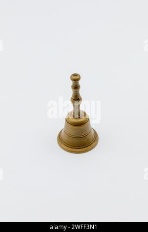 photograph of small bell for ringing use on white background Stock ...