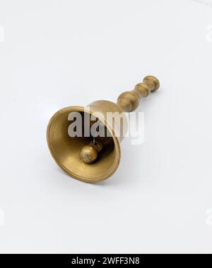 photograph of small bell for ringing use on white background Stock ...