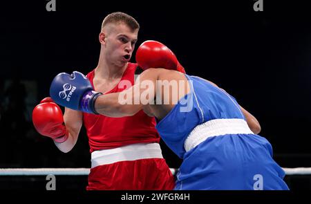 Alan Perrie (left) in action during their round of 32 bout against Soma ...