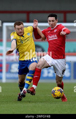 Arthur Read of Colchester United and Joe Taylor at the final whistle ...