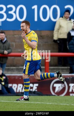 Arthur Read of Colchester United celebrates scoring his side's third ...