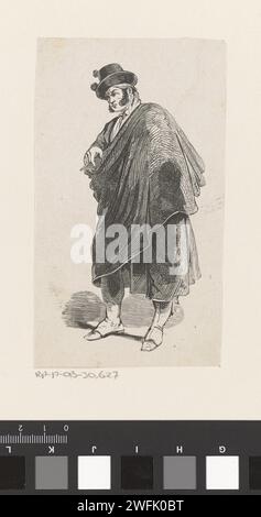 Standing man with a turned cape Stock Photo - Alamy